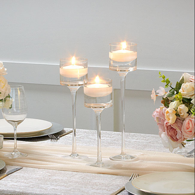 9 Floating Candles and 9 Monet Stem Holders – Yummi Candles Canada