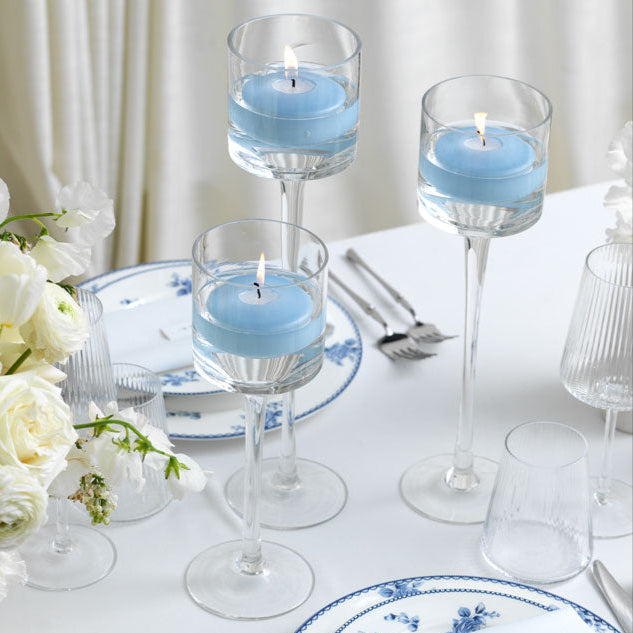 9 Floating Candles and 9 Monet Stem Holders – Yummi Candles Canada